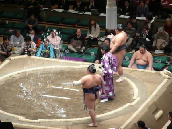 Slapping of the belly, pounding of the legs and throwing of the salt at ...